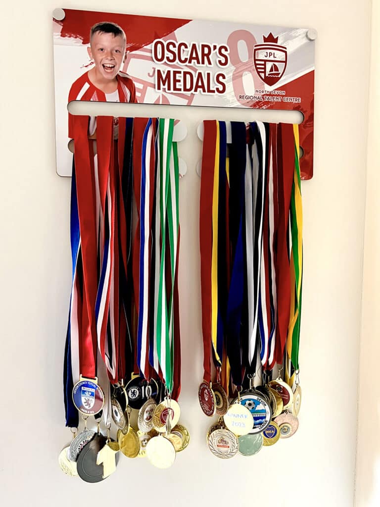 Themed Top Medal Hangers - Custom Cut - Subli Metals Ltd
