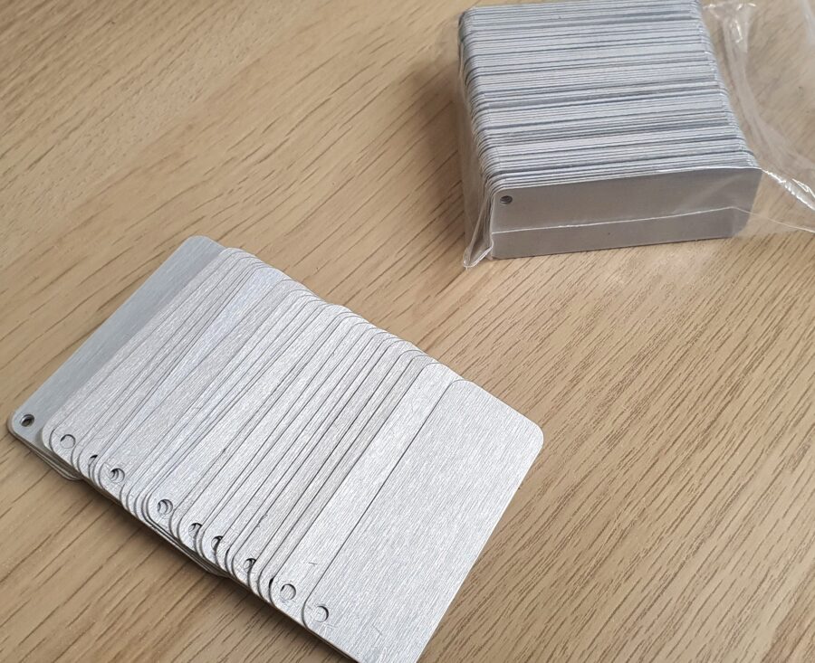 Discounted Budget Long Rectangular Keyring (65 x 25mm) - scratched backs (front not affected ...